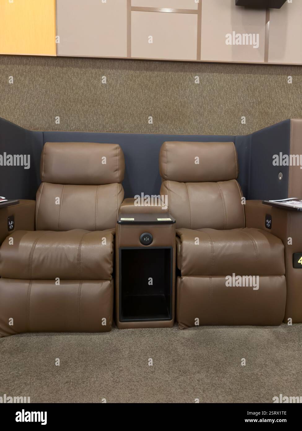Luxury VIP cinema seats with reclining function Stock Photo - Alamy