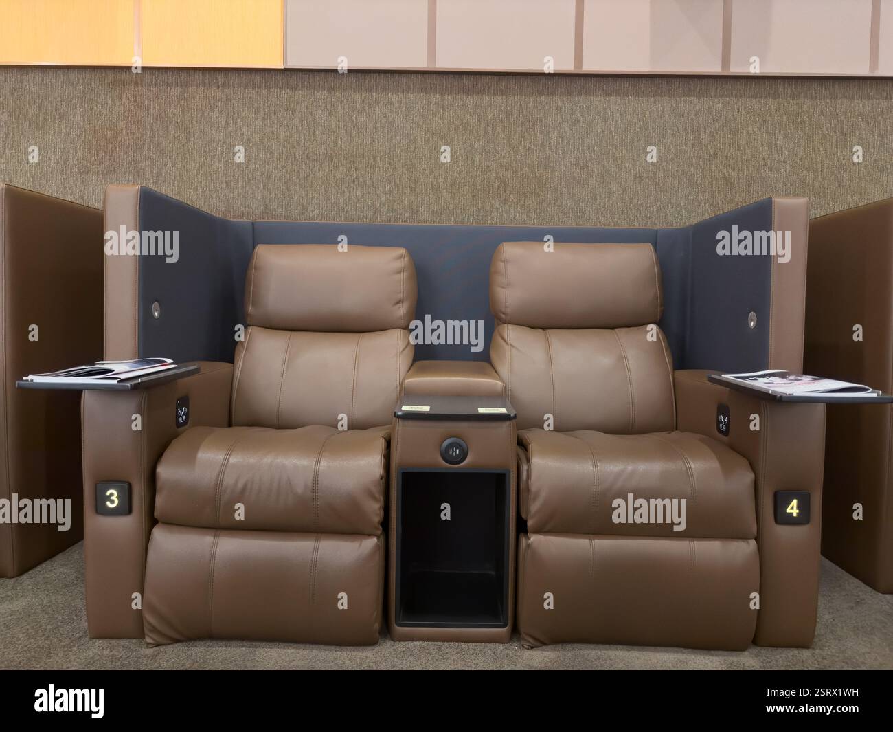 Luxury VIP cinema seats with reclining function Stock Photo - Alamy