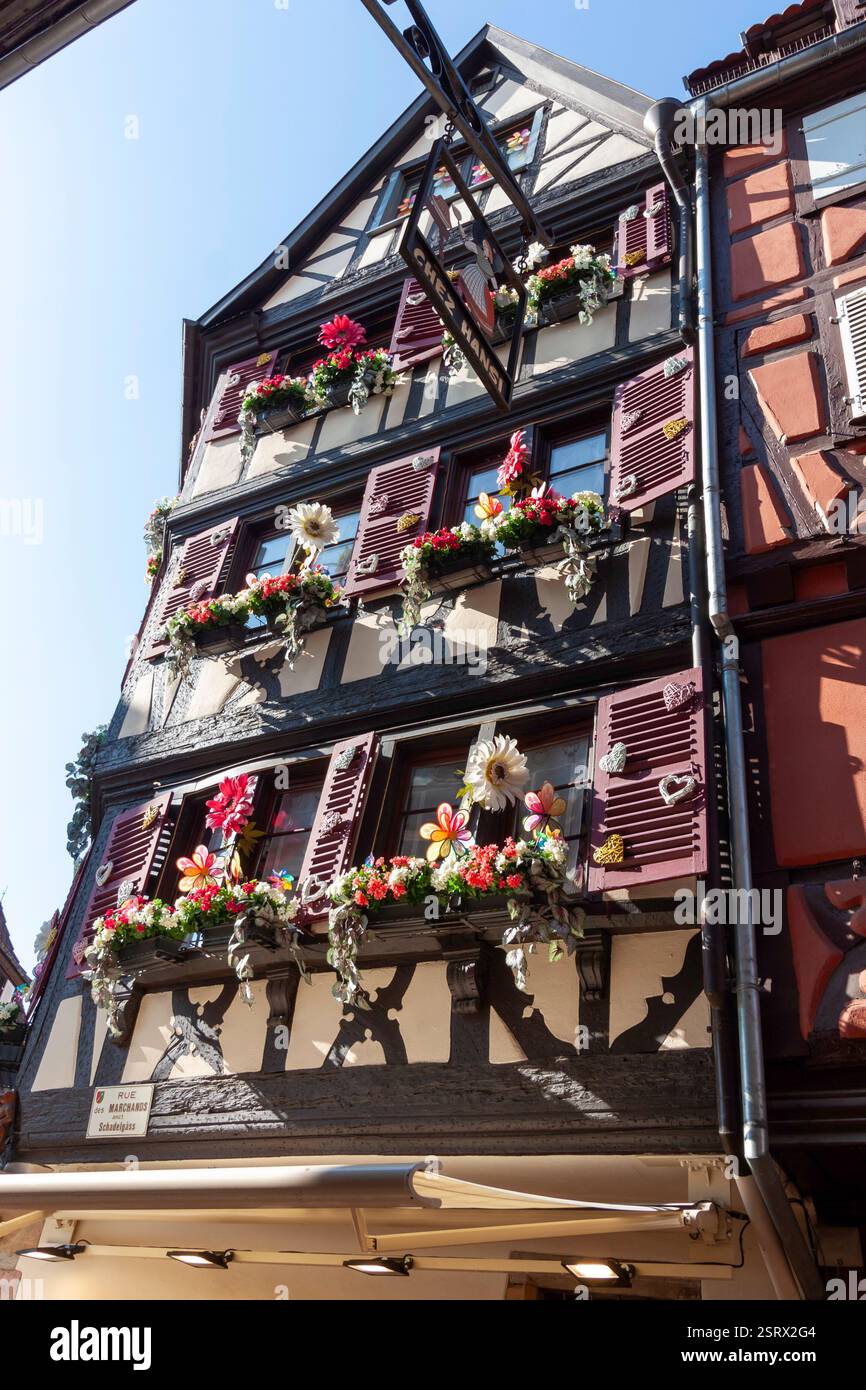 COLMAR, FRANCE - SEPTEMBER 20, 2024: Decorated half-timbered houses in ...