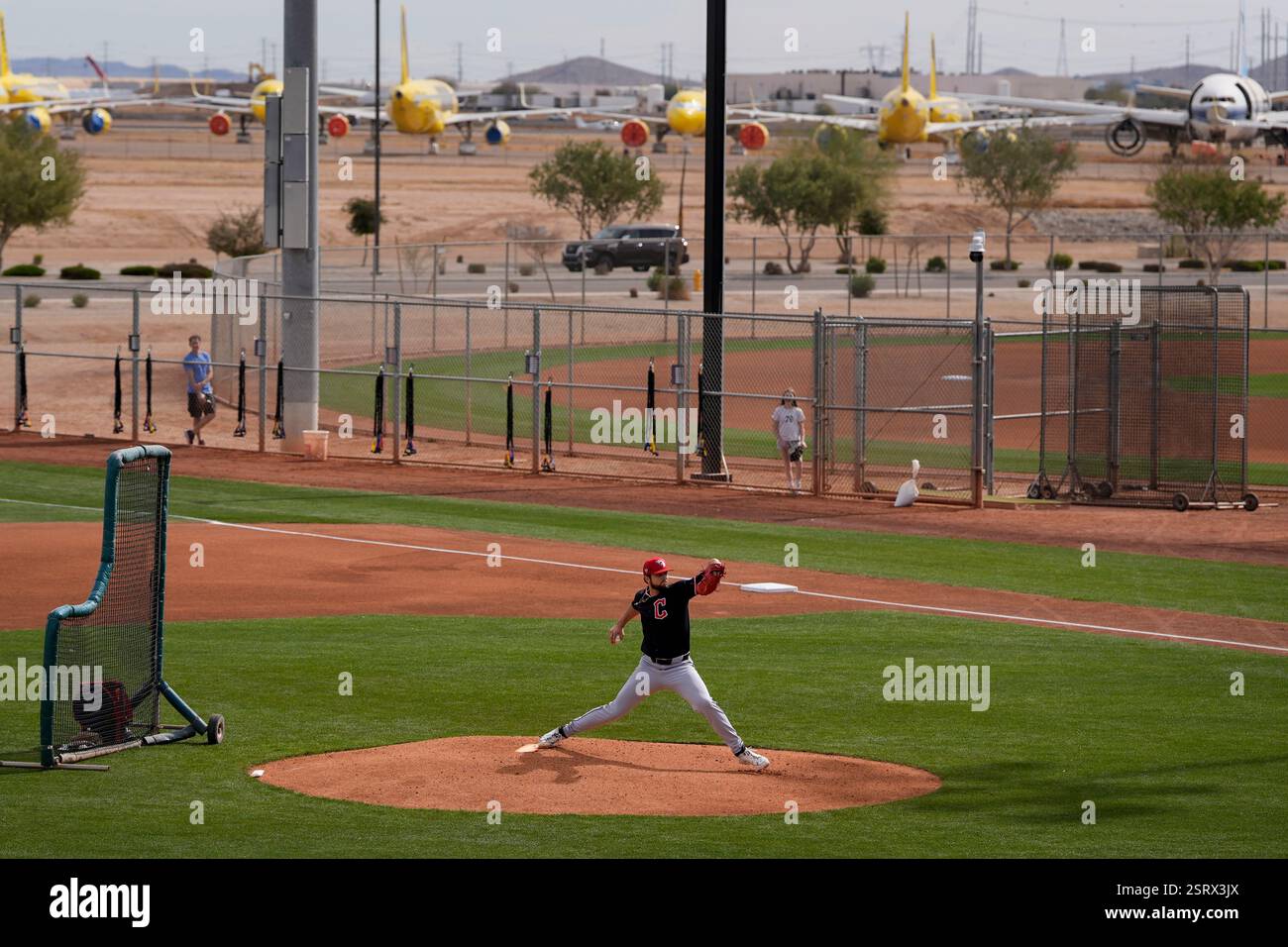 Cleveland Guardians pitcher Slade Cecconi throws as fans watch for ...