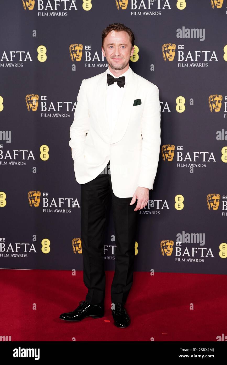 Tom Felton in the press room during the 78th British Academy Film ...