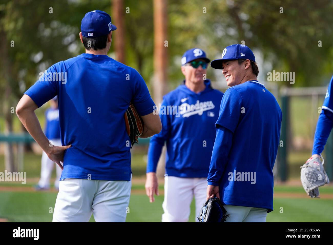 Los Angeles Dodgers two-way player Shohei Ohtani, left, and pitcher ...