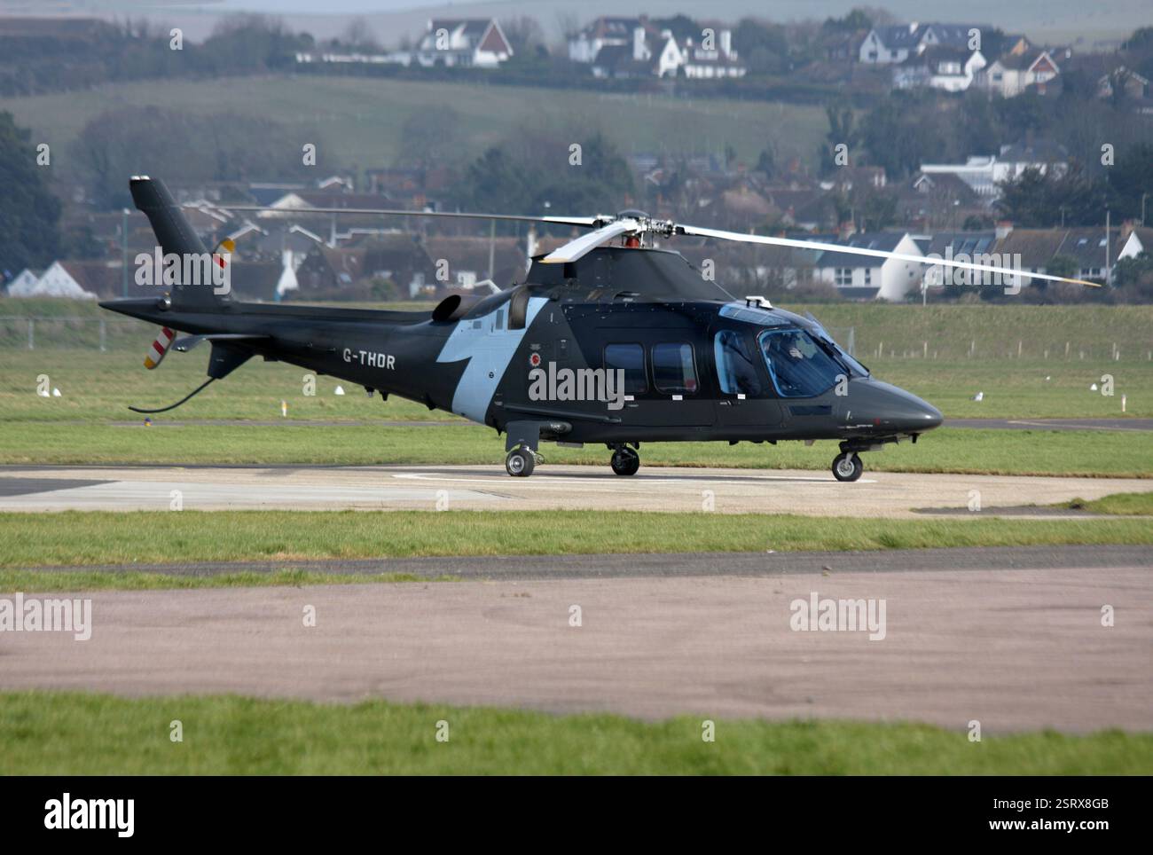 An Agusta-Westland AW-109SP helicopter of Saxon Air at Brighton City ...