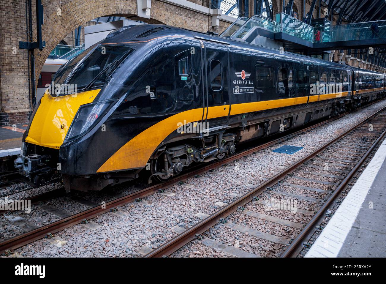 Grand Central Train at Kings Cross Station London. Grand Central Train ...