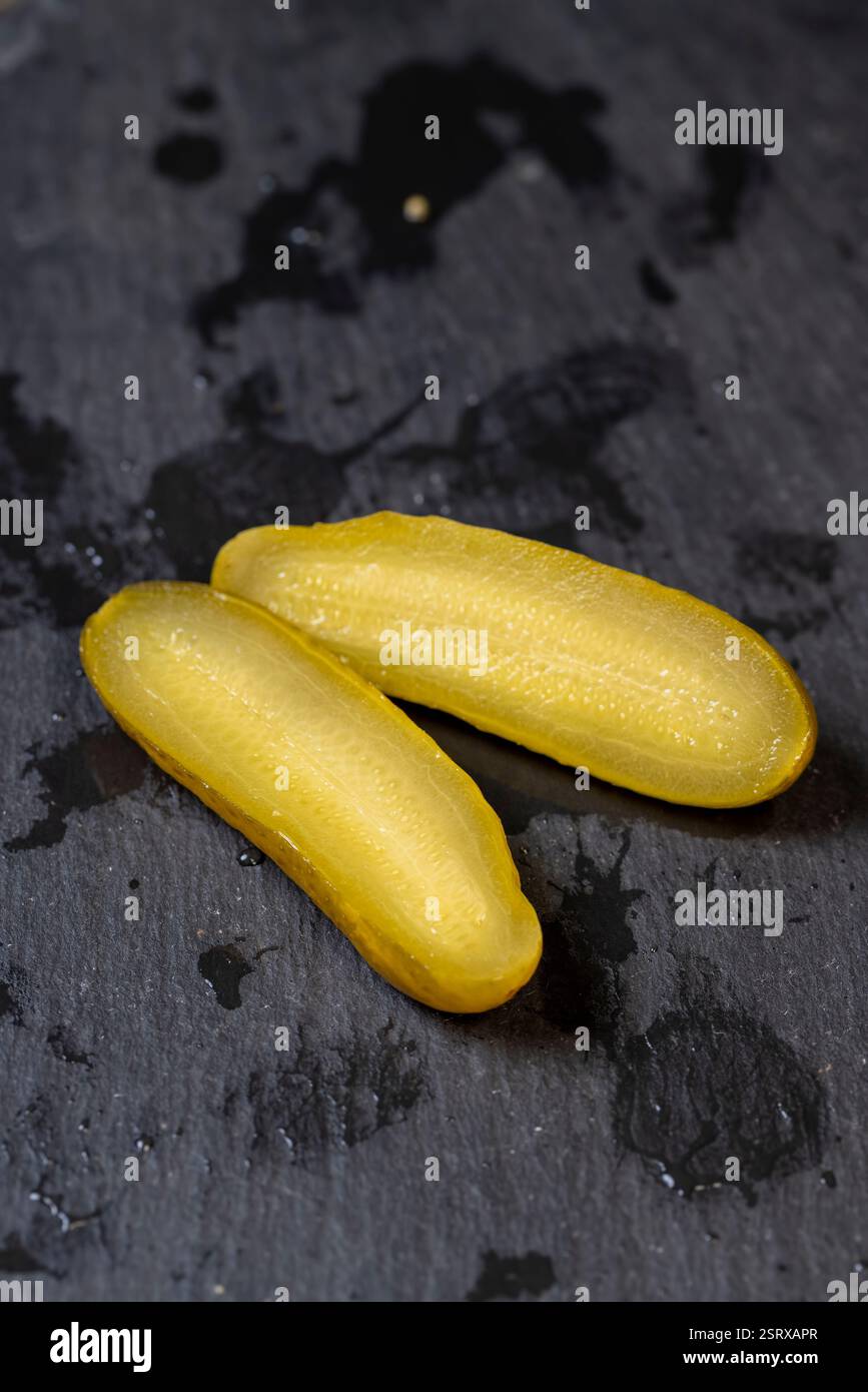 cut small, crispy green cucumbers salted with spices closeup Stock ...