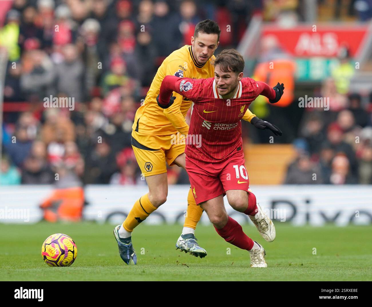 Liverpool, UK. 16th Feb, 2025. Alexis Mac Allister of Liverpool (R) is ...
