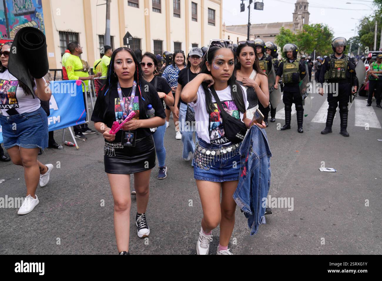 Fans of Colombian pop star Shakira leave the National Stadium upon learning she canceled her ...