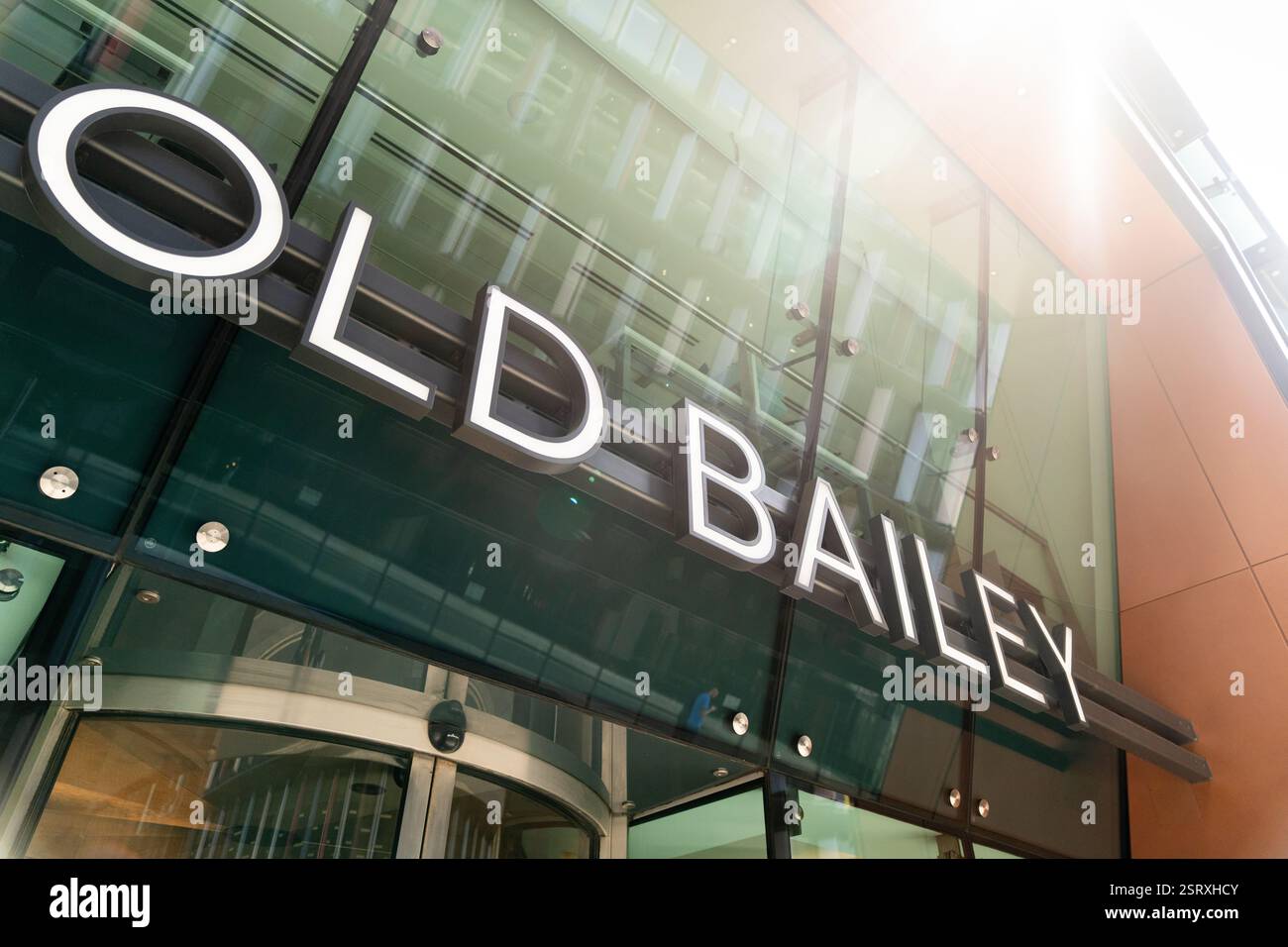 Old Bailey store front, likely in London, England. Retail signage on modern building Stock Photo ...