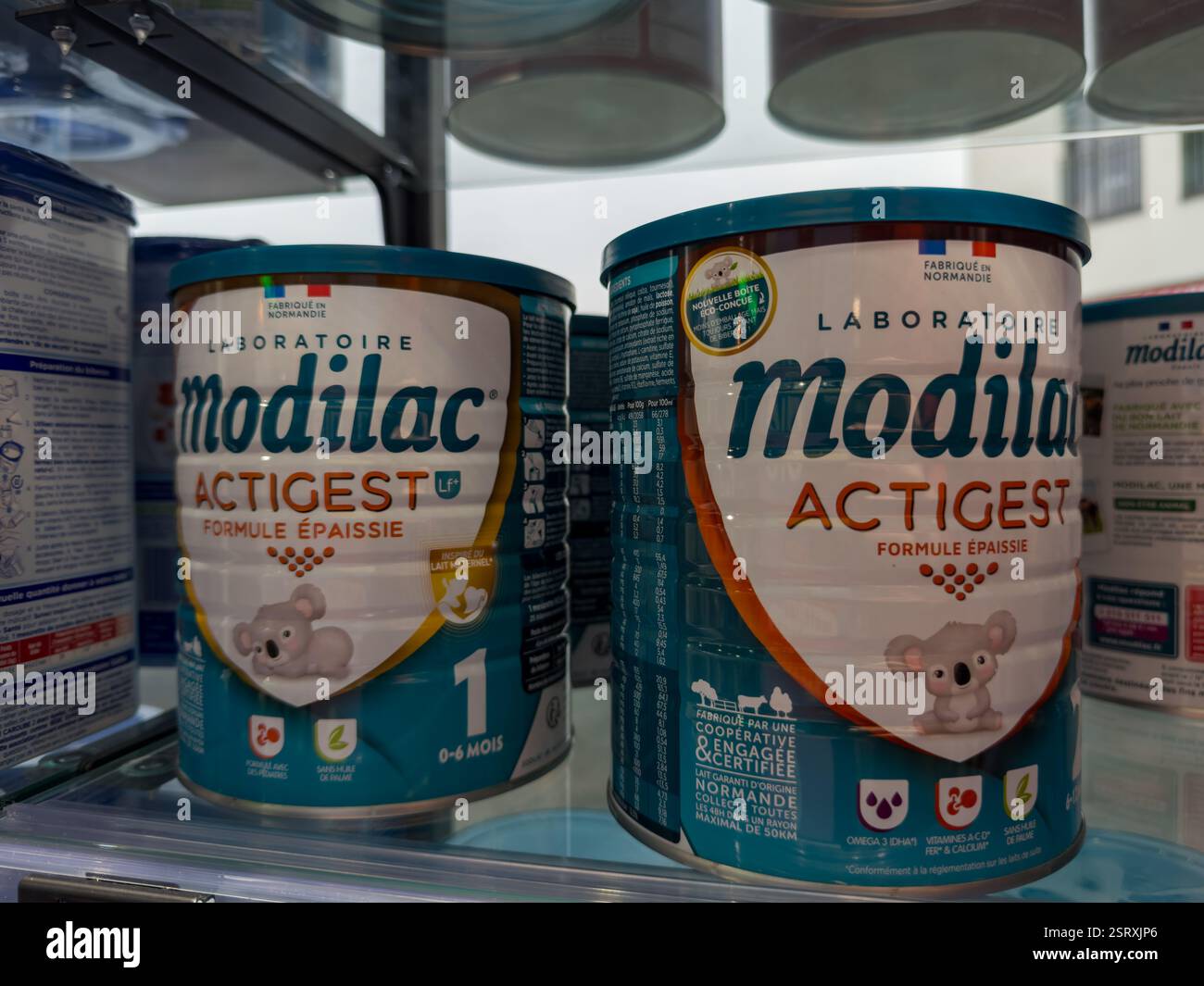 Unique baby formula cans on display in a grocery store aisle Stock ...