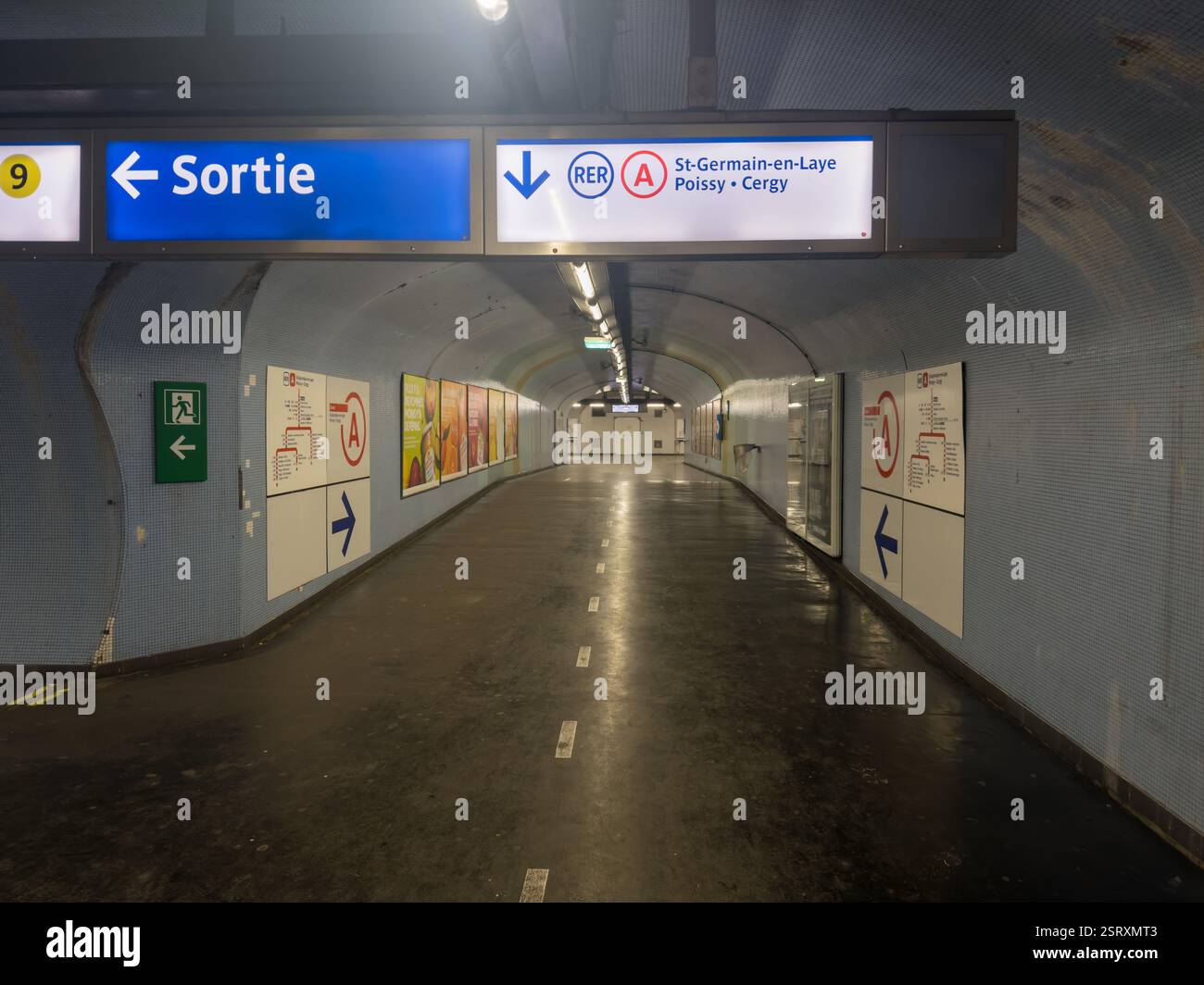 Quiet underground passageway leads to the exit in a metropolitan ...