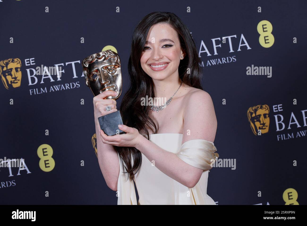 Mikey Madison poses with the leading actress award for 'Anora' at the ...