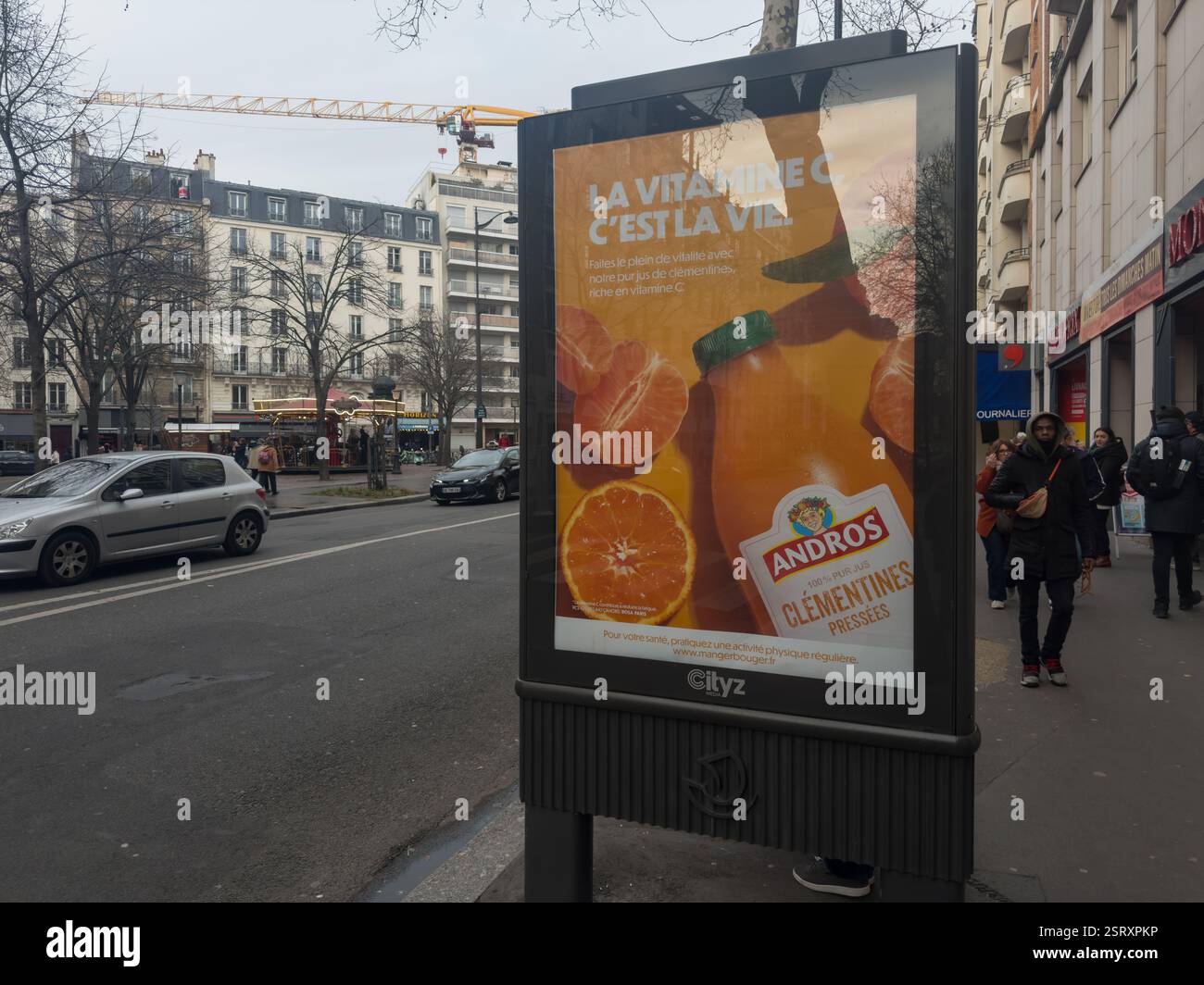 Vibrant city life with a refreshing advertisement on a busy street ...