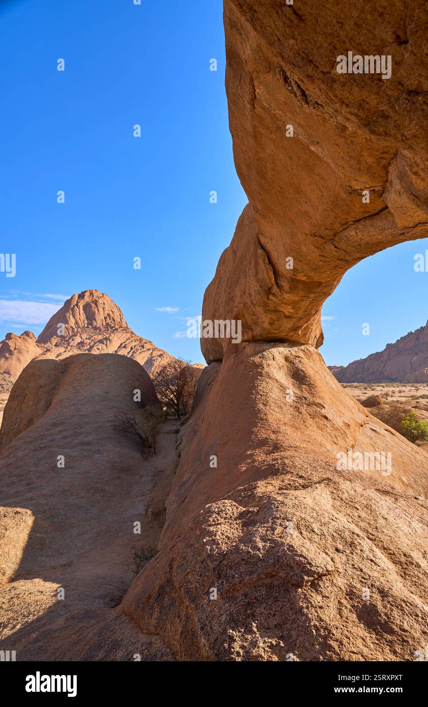 A view from within the Rock Arch, Spitzkoppe mountain on the left, Namibia, Africa Stock Photo ...