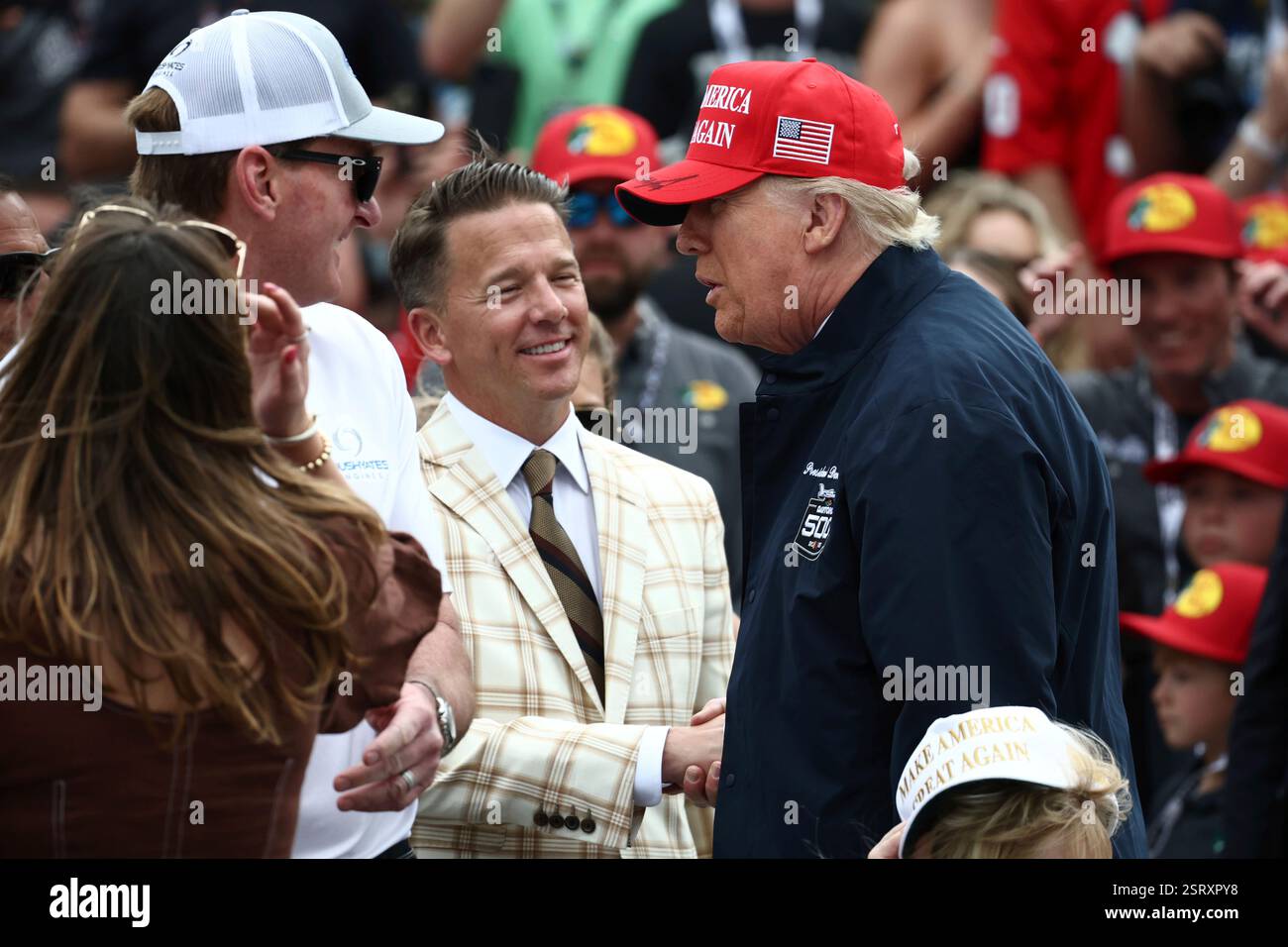 President Donald Trump talks with Frank Kelleher, president of the ...