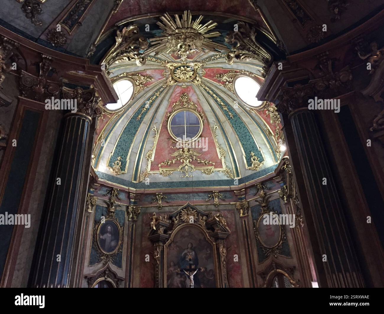 Chapel. Ornate ceiling with intricate gold and colorful details ...