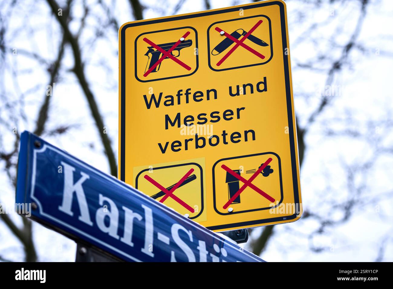 Munich, Bavaria, Germany - February 14, 2025: A yellow sign with the ...