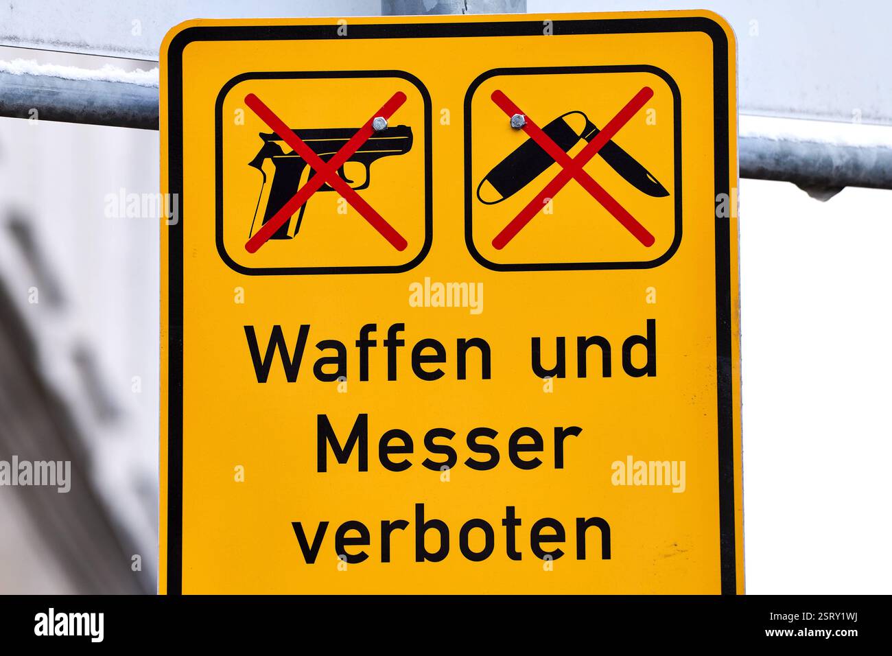 Munich, Bavaria, Germany - February 14, 2025: A yellow sign with the ...