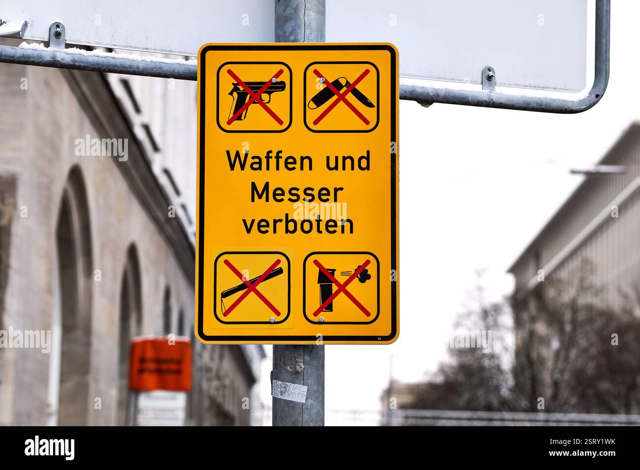 Munich, Bavaria, Germany - February 14, 2025: A yellow sign with the ...