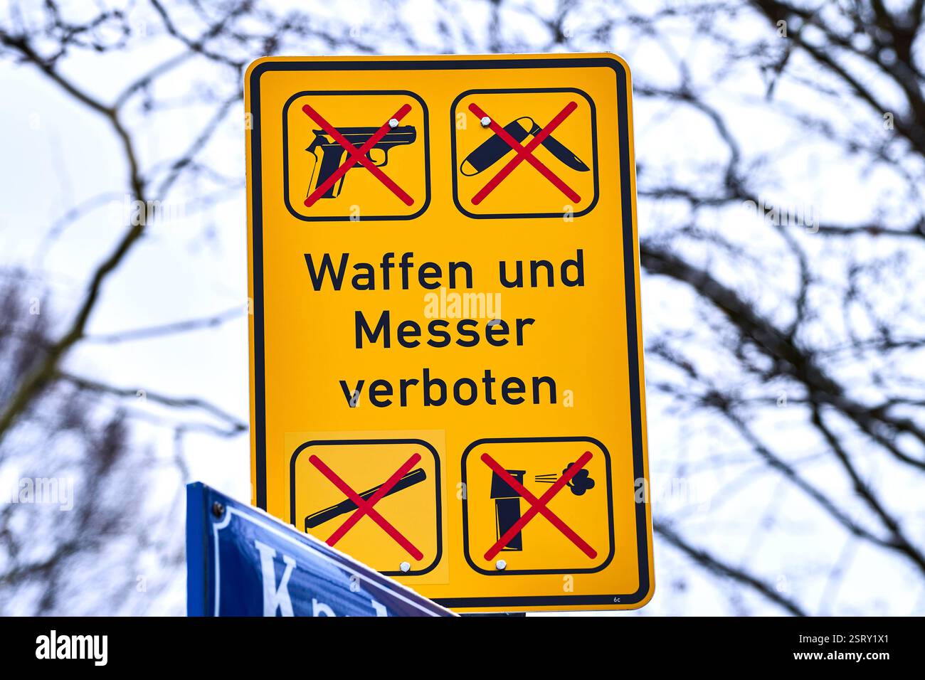 Munich, Bavaria, Germany - February 14, 2025: A yellow sign with the ...