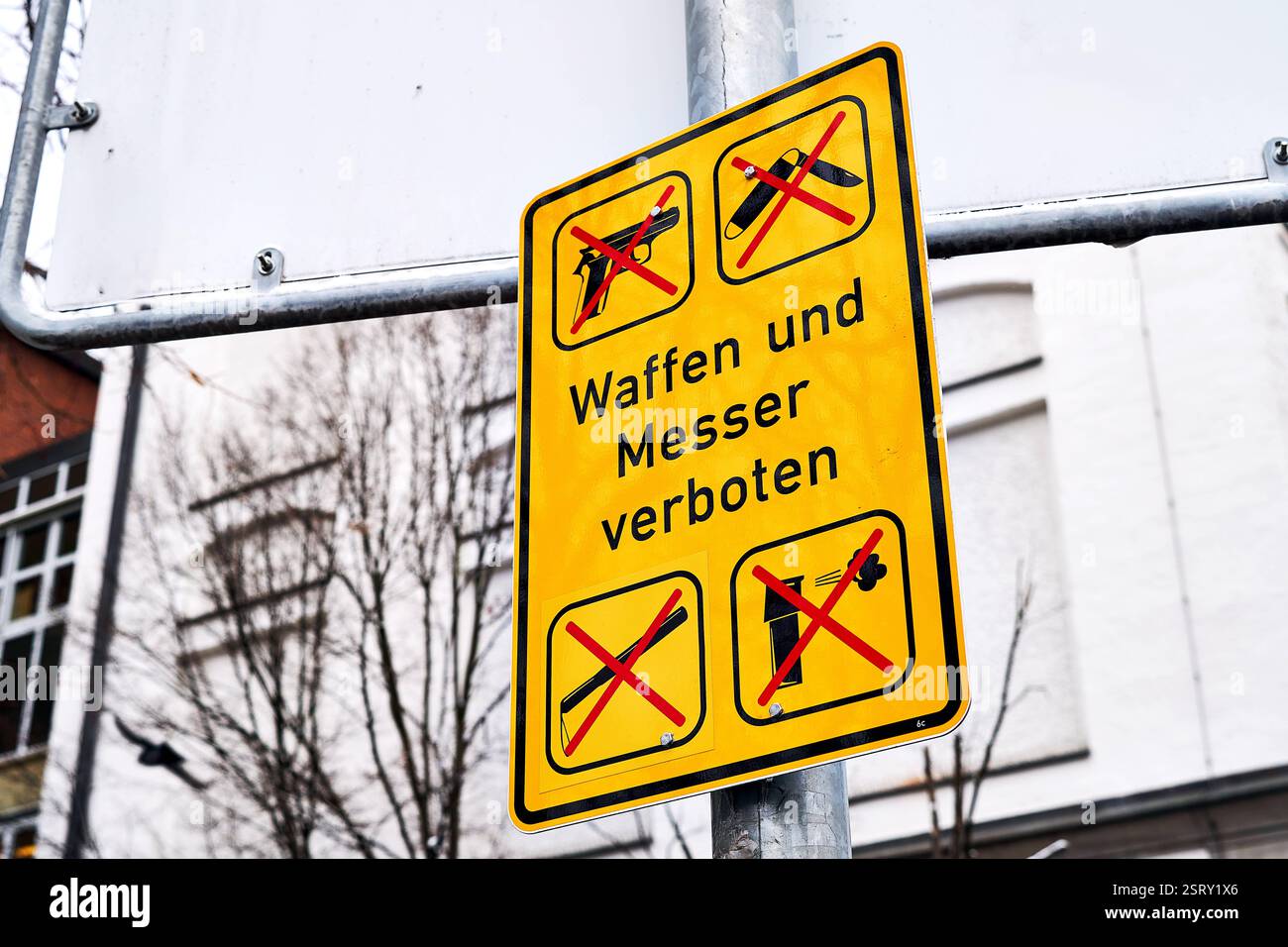Munich, Bavaria, Germany - February 14, 2025: A yellow sign with the ...