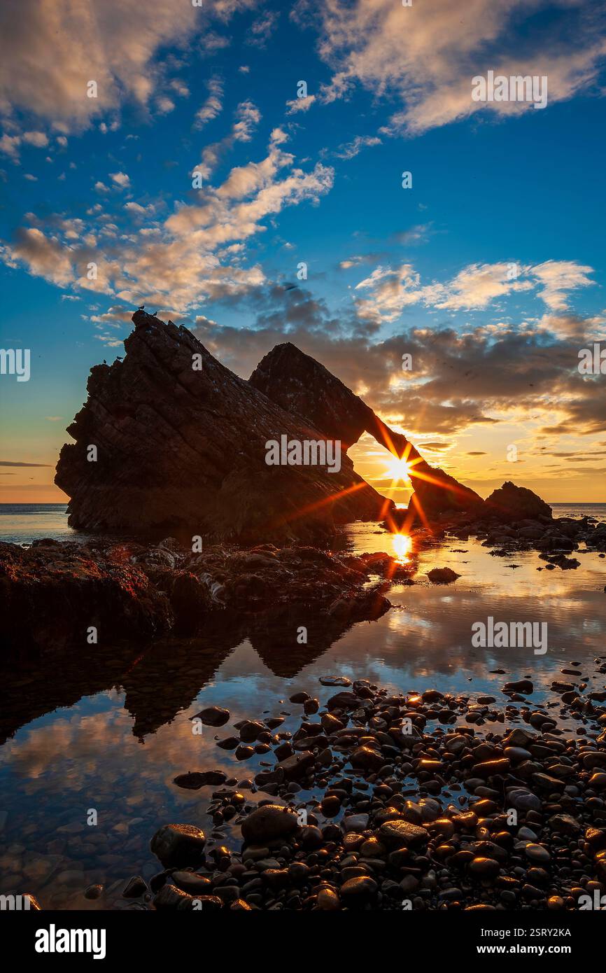 Summer view at dawn of the Bow Fiddle Rock near Portknockie on the ...