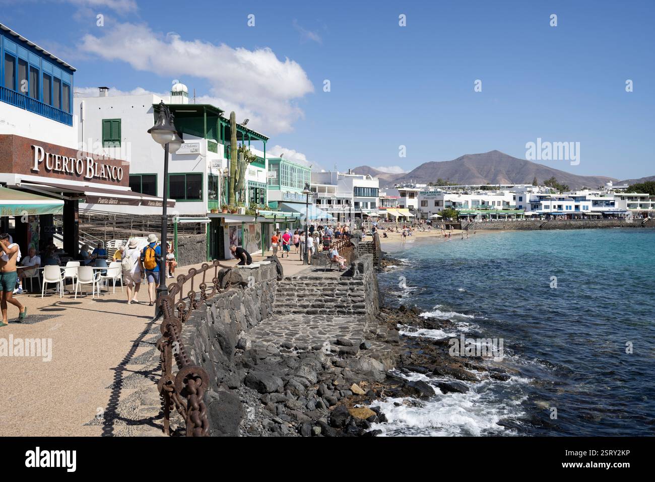 Shops and restaurants along the promenade at Playa Blanca beach ...