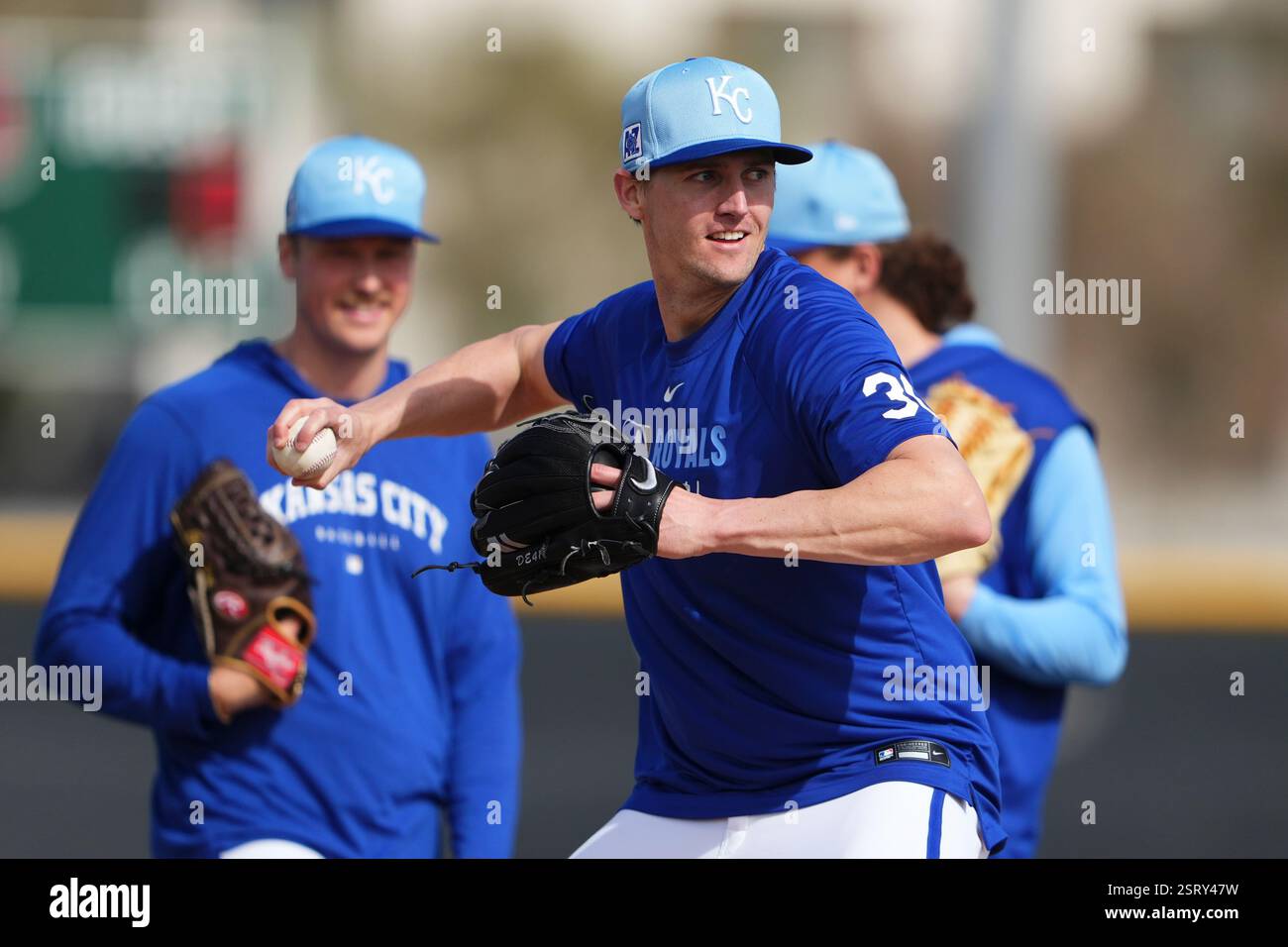 Kansas City Royals starting pitcher Kyle Wright throws to first base ...