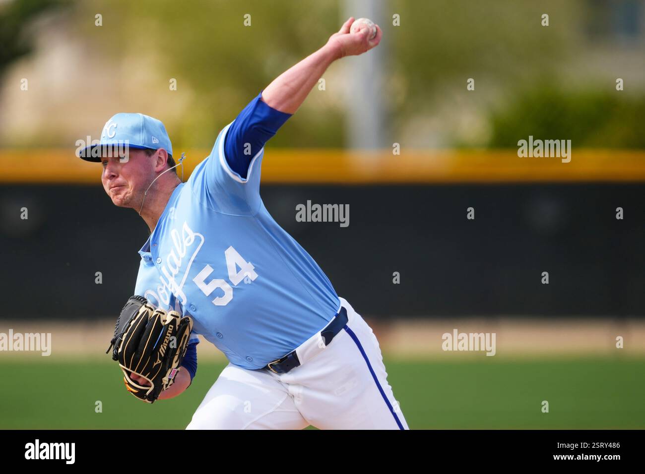 Kansas City Royals pitcher Austin Cox throws during spring training ...
