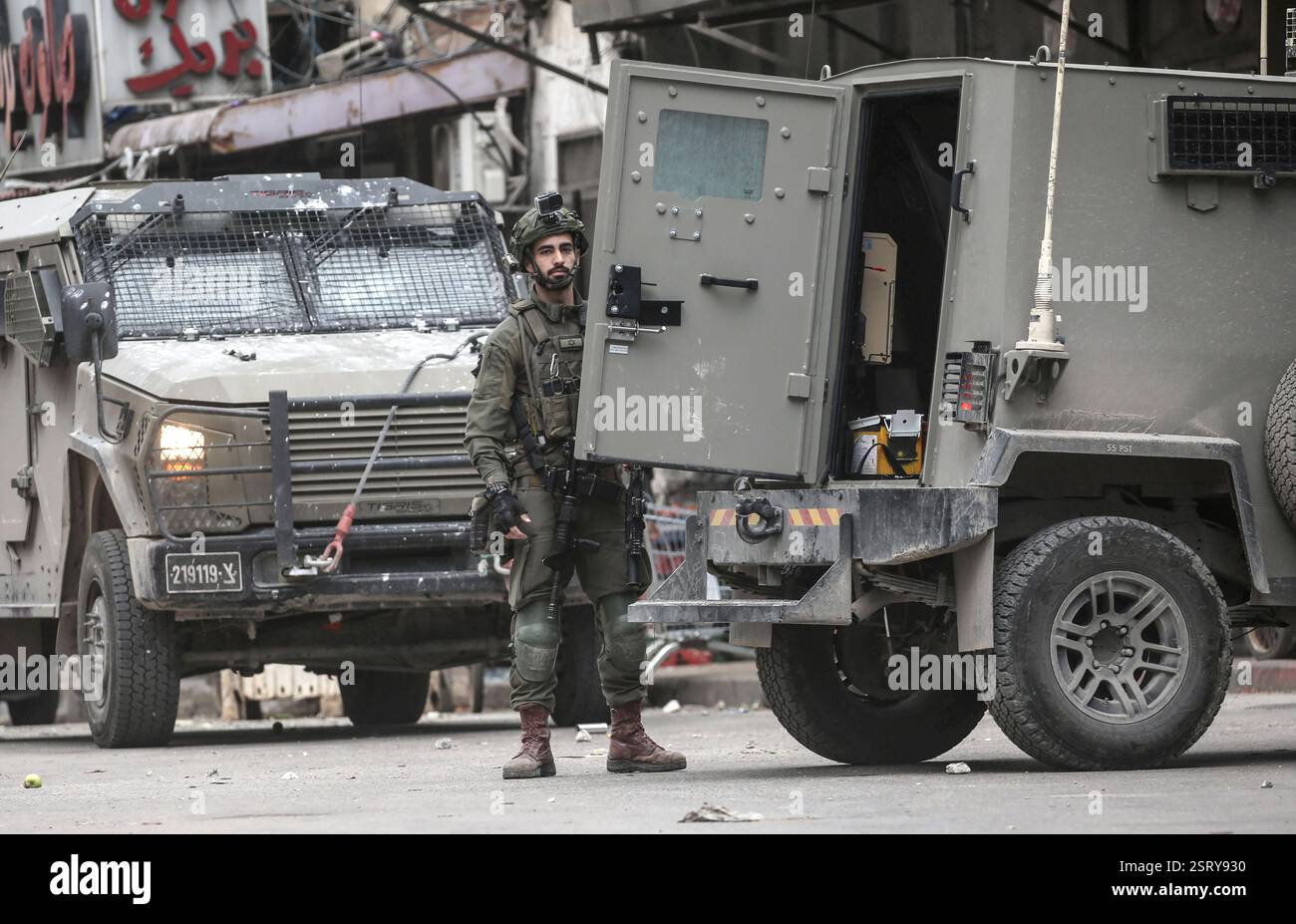 Nablus, Palestine. 16th Feb, 2025. Israeli military vehicles and ...