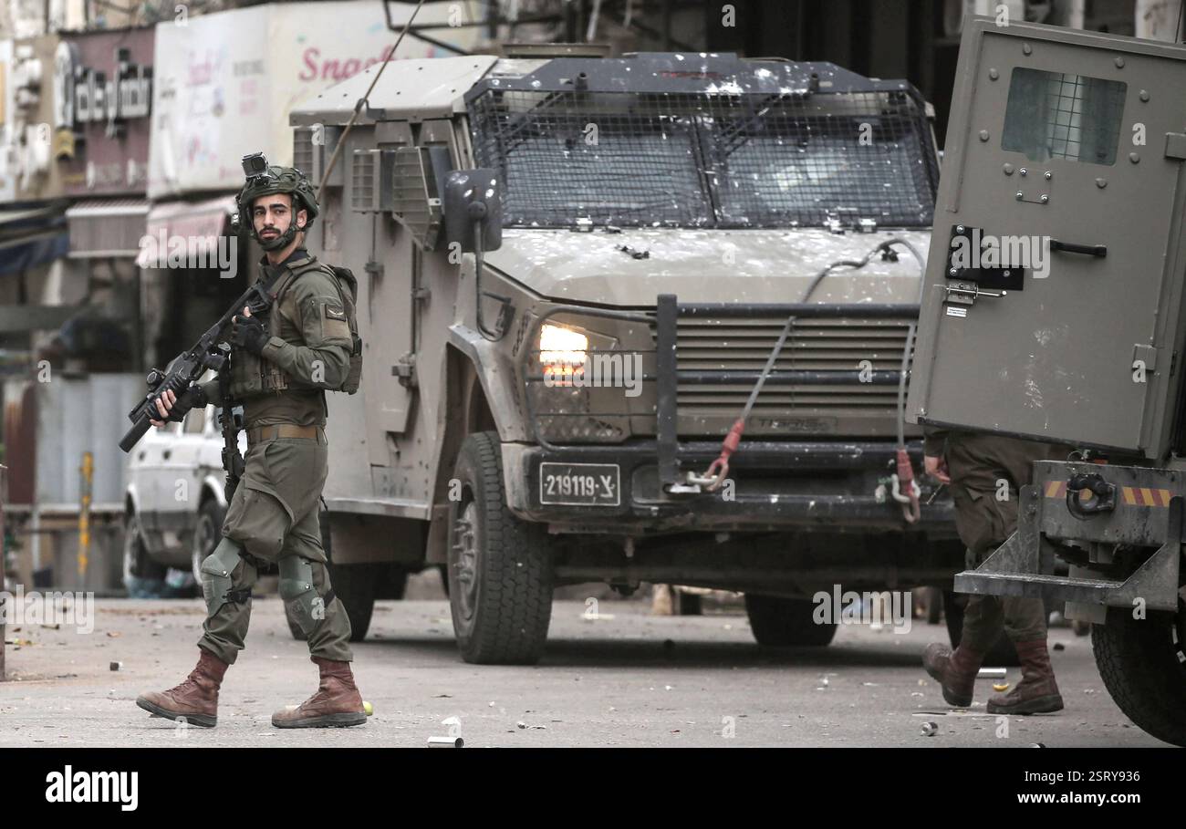 Nablus, Palestine. 16th Feb, 2025. Israeli military vehicles and ...