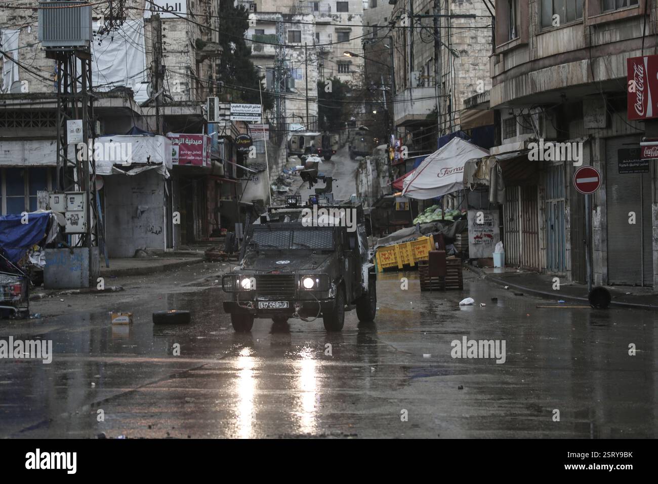 Nablus, Palestine. 16th Feb, 2025. Israeli military vehicles and ...