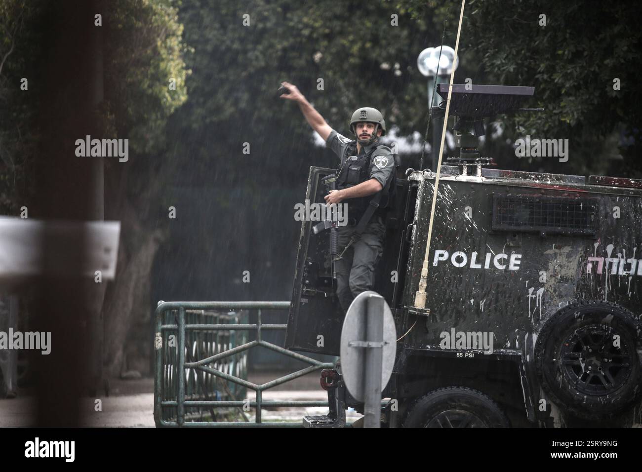 Nablus, Palestine. 16th Feb, 2025. An Israeli soldier throws a sound ...