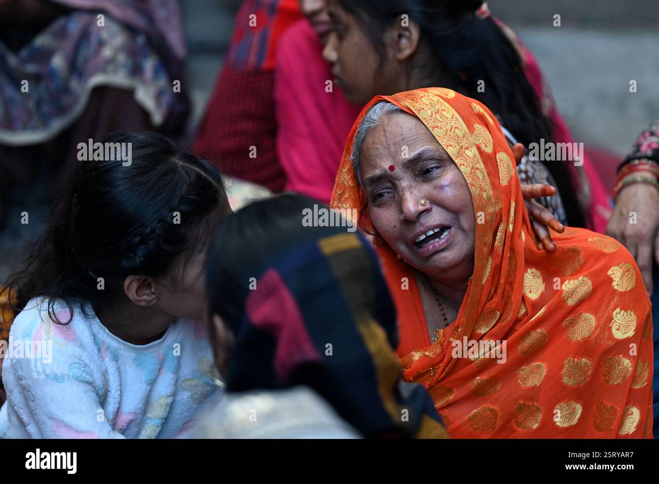 NEW DELHI, INDIA - FEBRUARY 16: Family members of Pinki Devi (who died ...