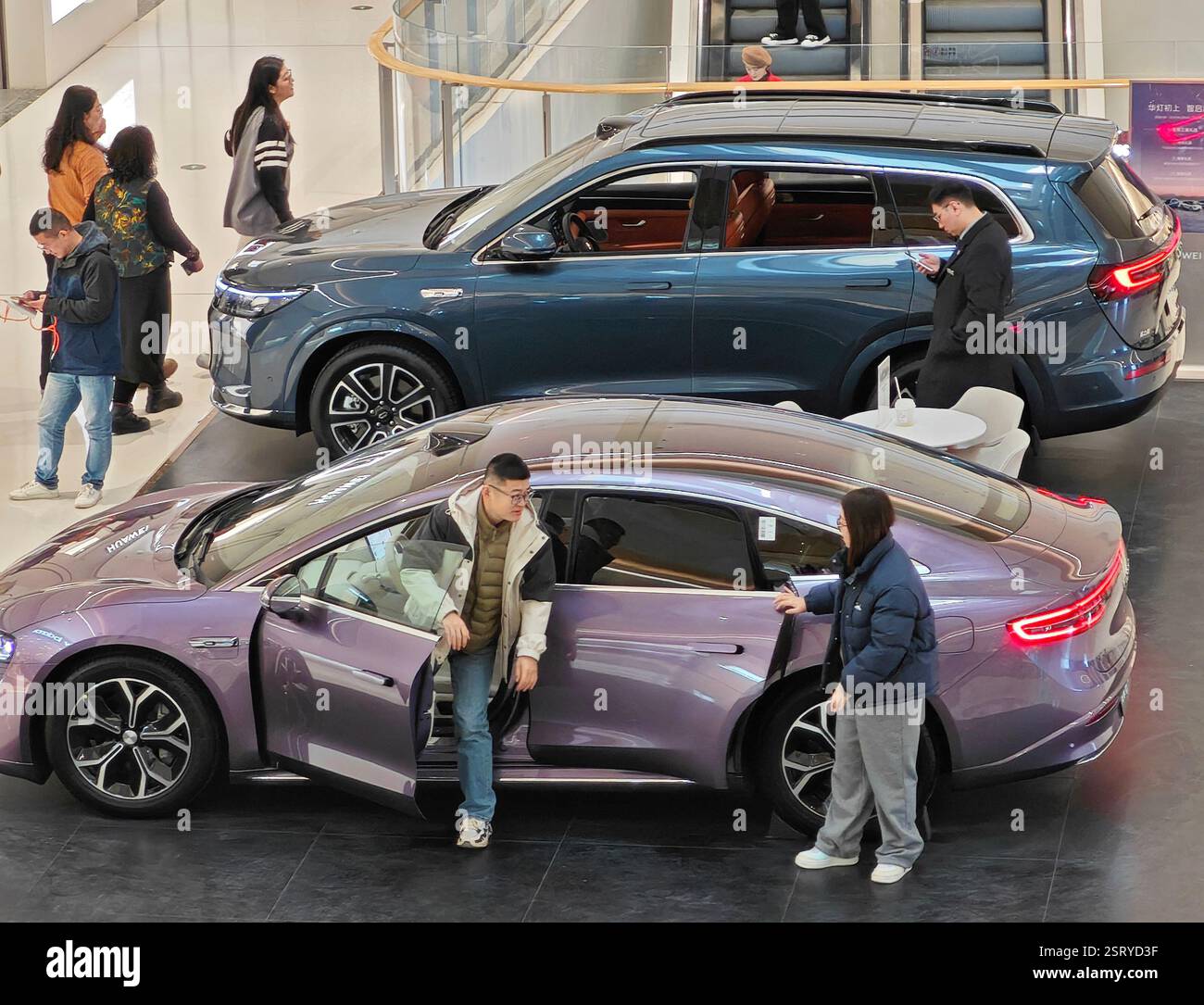 YANTAI, CHINA - FEBRUARY 16, 2025 - Customers learn about Harmony OS ...