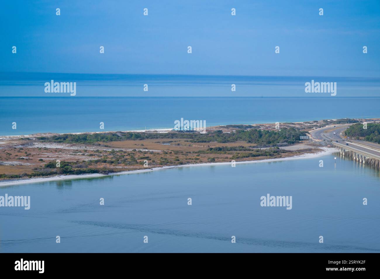Destin, Florida, where the bridge stretches over crystal-clear waters ...