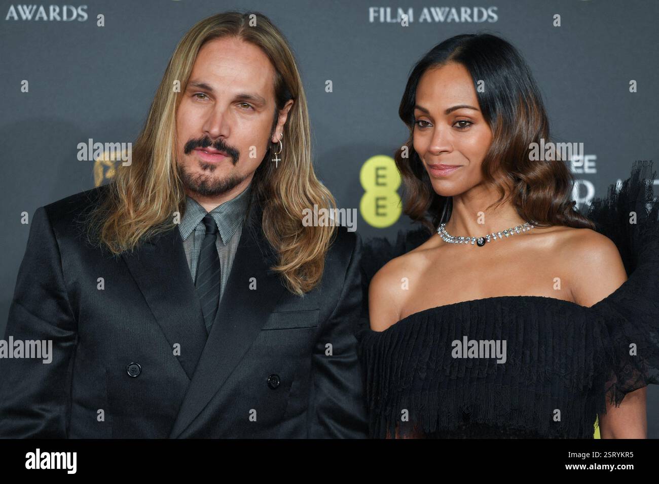 Marco Perego and Zoe Saldana attending the 2025 EE BAFTA Film Awards at ...