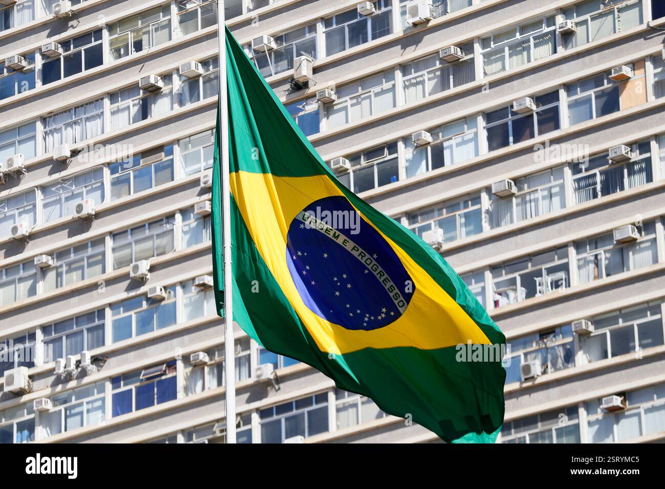 brazilian flag with building in background. Sao Paulo, Brazil Stock ...