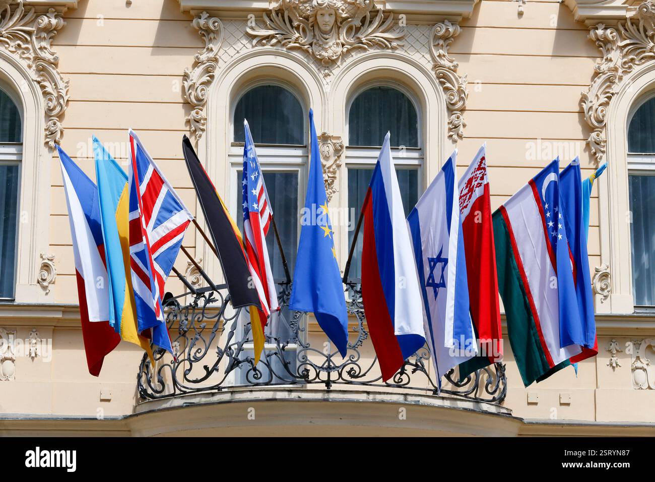 Flags of many countries on balcony of building Stock Photo - Alamy