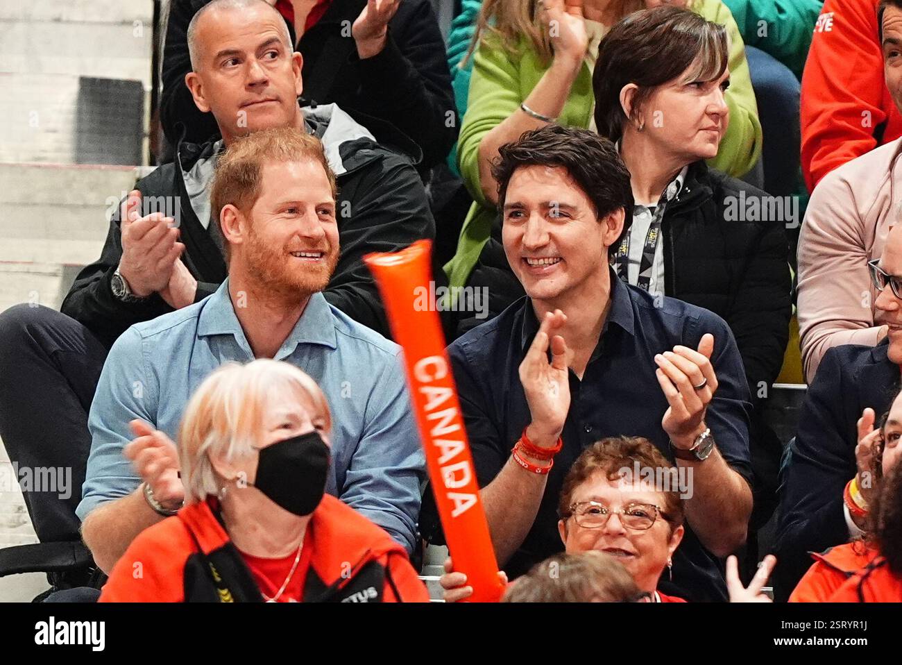 The Duke of Sussex sits with Prime Minister of Canada Justin Trudeau as ...