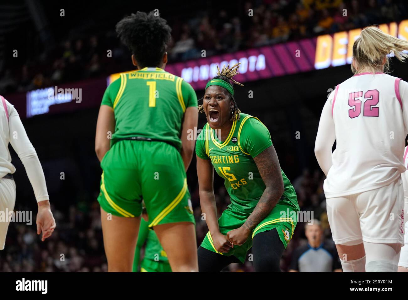 Oregon center Phillipina Kyei (15) celebrates after making a shot at ...