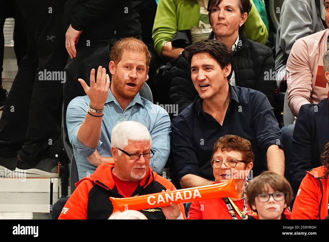 The Duke of Sussex sits with Prime Minister of Canada Justin Trudeau as ...