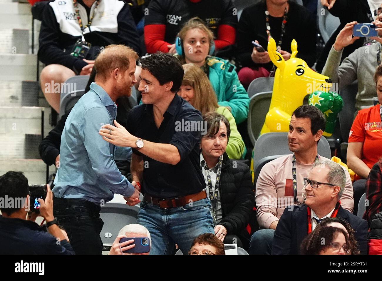The Duke of Sussex sits with Prime Minister of Canada Justin Trudeau as ...