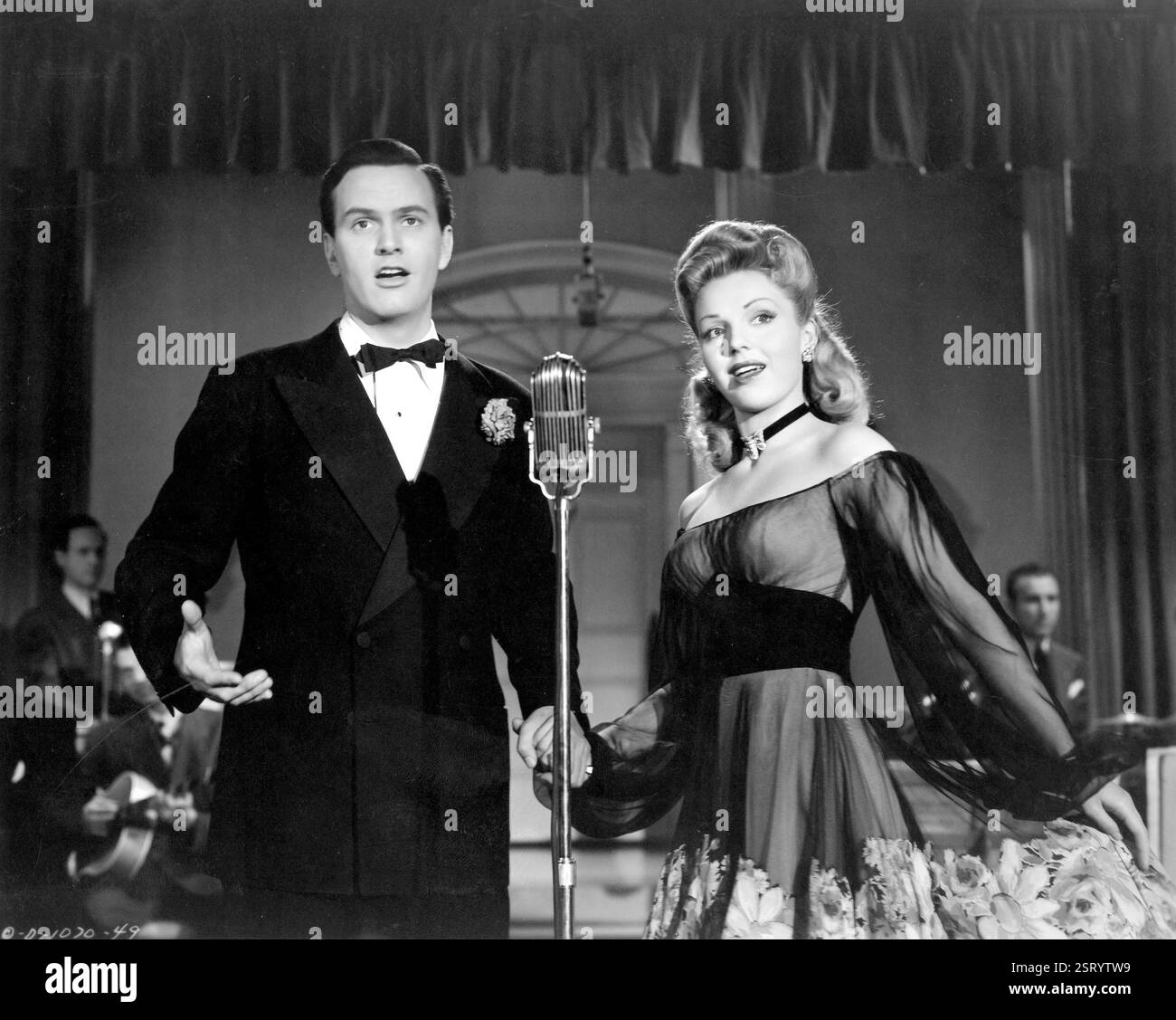 THE BLONDE FROM BROOKLYN ROBERT STANTON, LYNN MERRICK Date: 1945 Stock ...