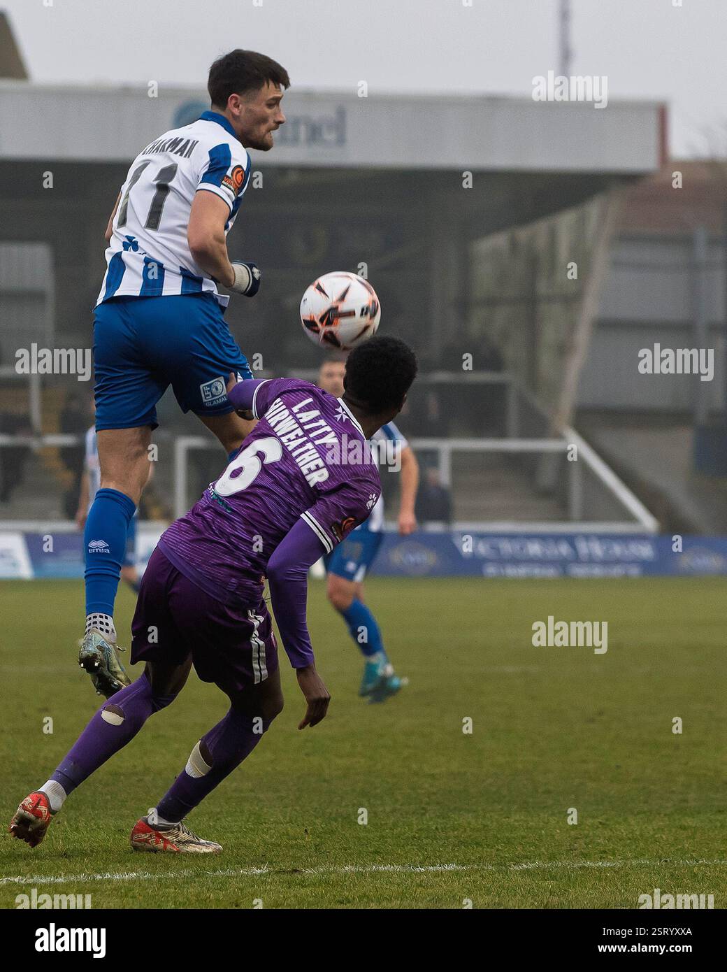 Hartlepool United's Luke Charman challenges for a header with ...