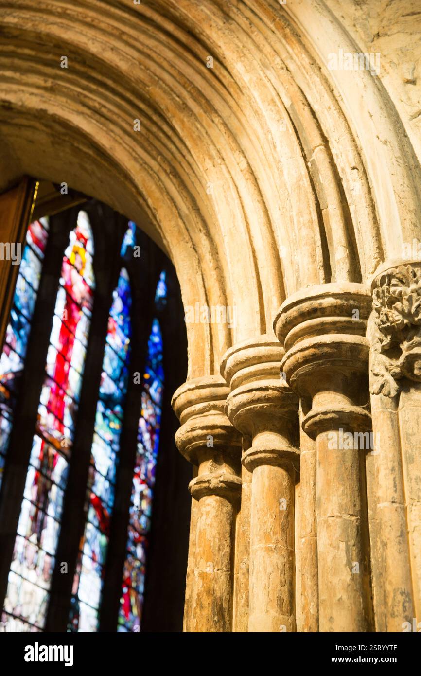 Gothic arches and pillars of St Etheldreda's Church. Stonework detail ...