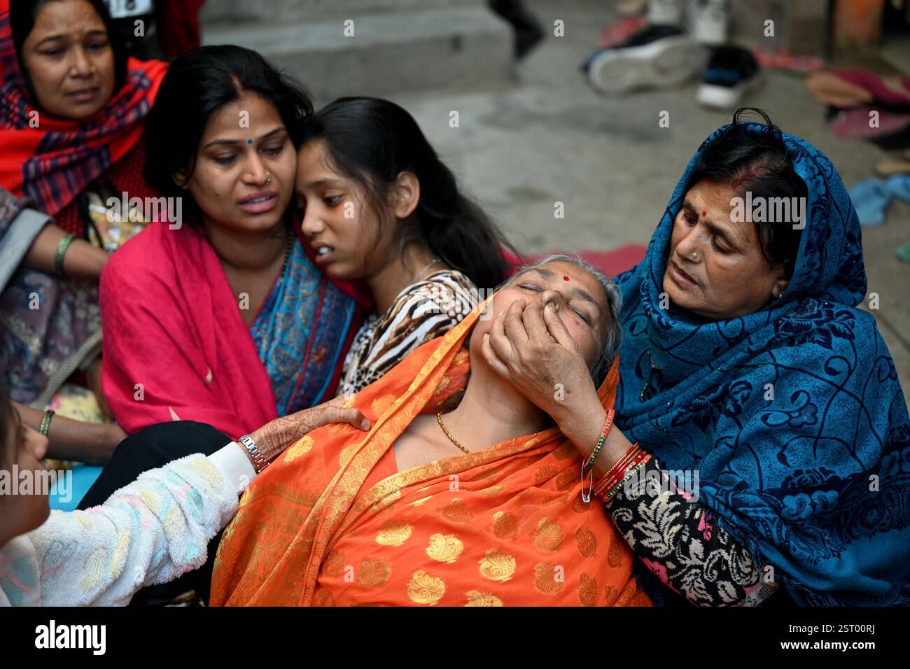 NEW DELHI, INDIA - FEBRUARY 16: Family members of Pinki Devi (who died ...
