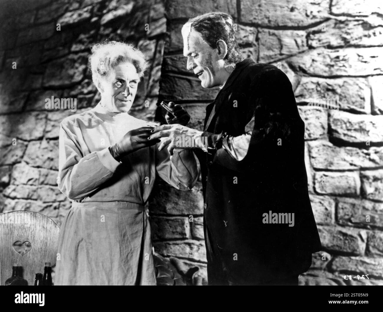 BRIDE OF FRANKENSTEIN ERNEST THESIGER, BORIS KARLOFF as the Monster ...