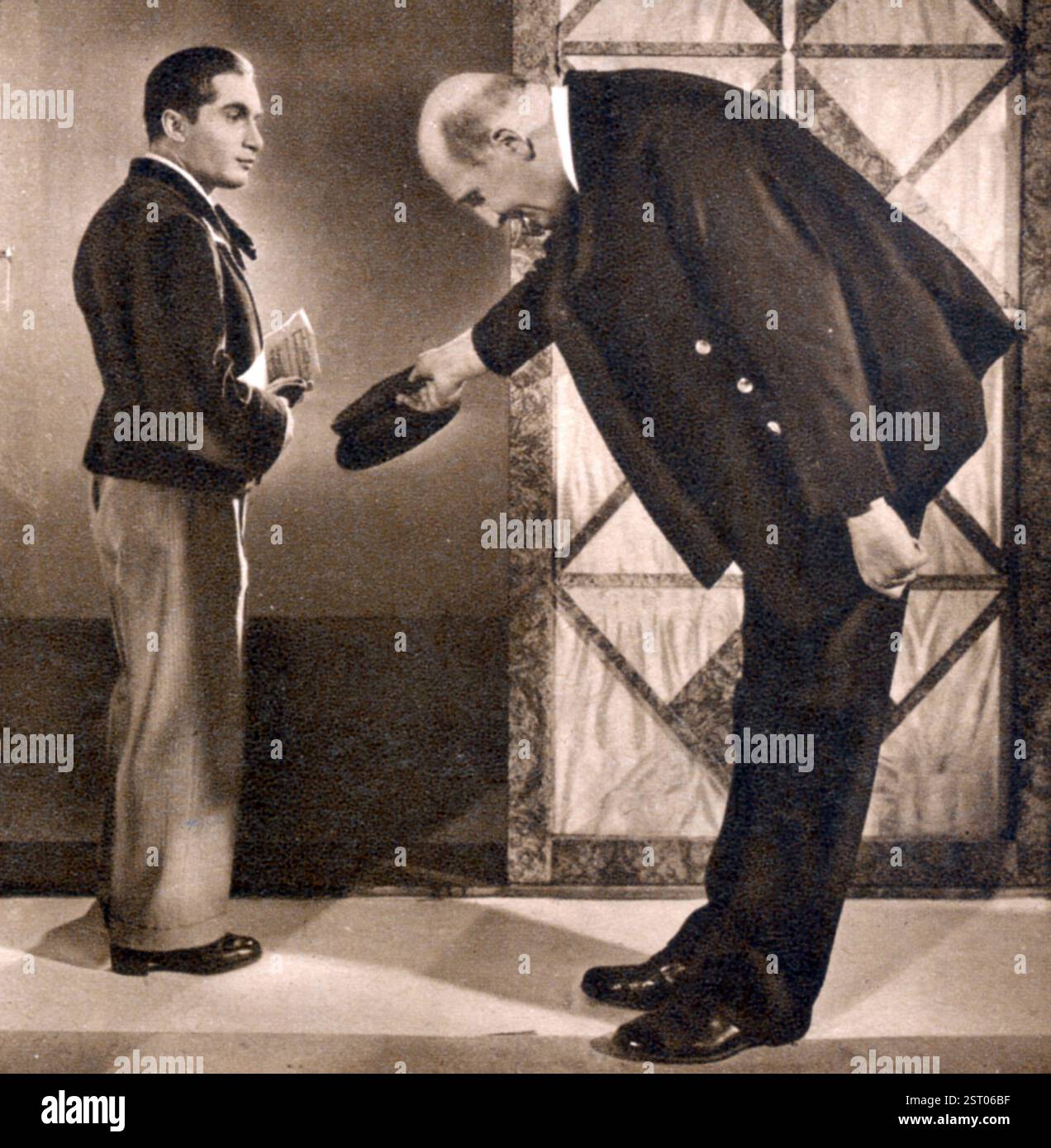 MY SONG GOES ROUND THE WORLD JOSEPH SCHMIDT (left) as the singer ...