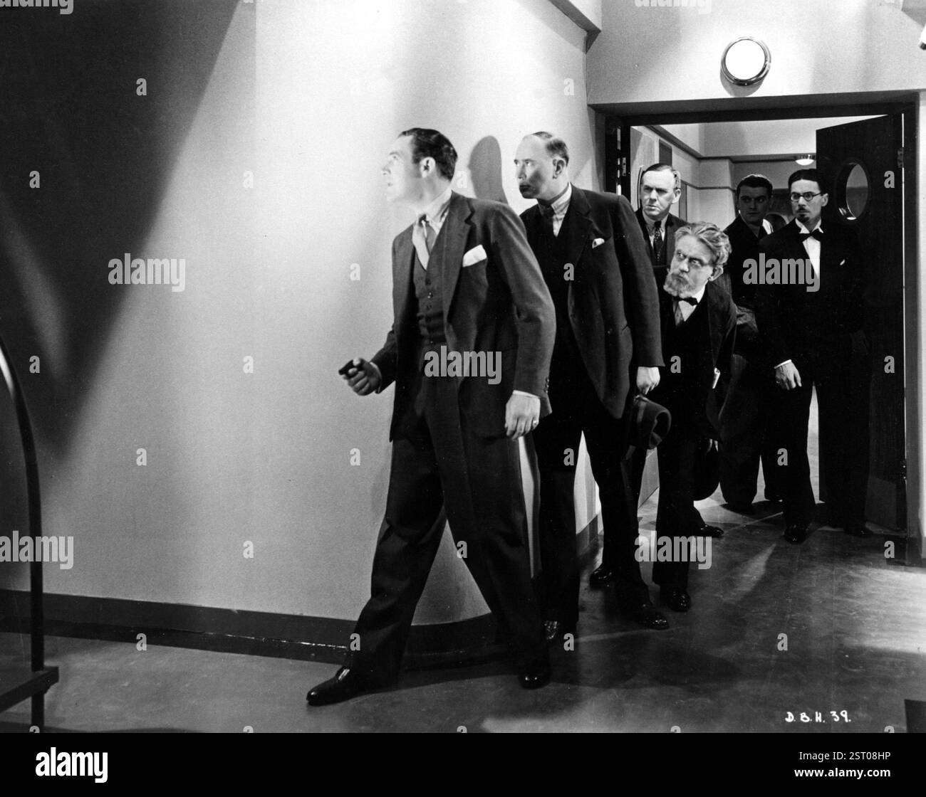 DEATH AT BROADCASTING HOUSE [BR 1934] IAN HUNTER [left], VINCENT HOLMAN ...