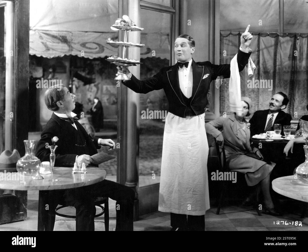 PLAYBOY OF PARIS [US 1930] MAURICE CHEVALIER [centre] Date: 1930 Stock Photo - Alamy